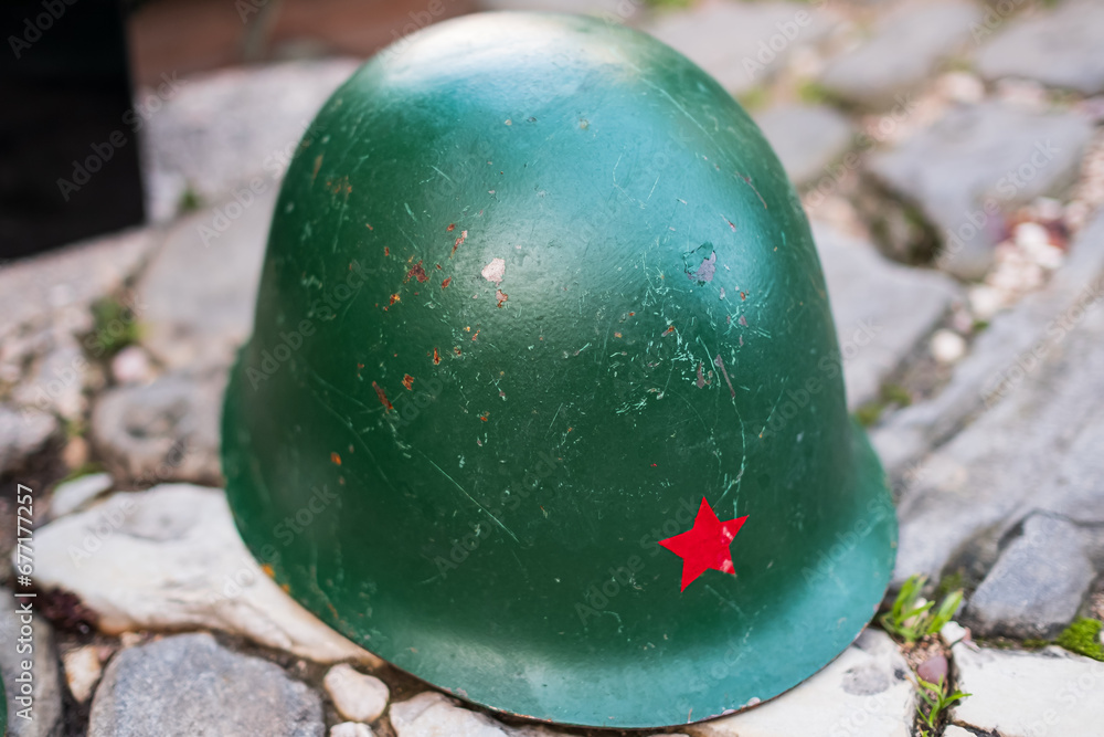 Old military helmet soviet army with a red star. A Soviet military ...