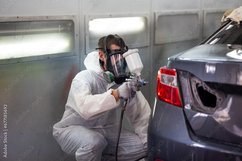 Auto mechanic car hispanic man worker working painting in car paint ...