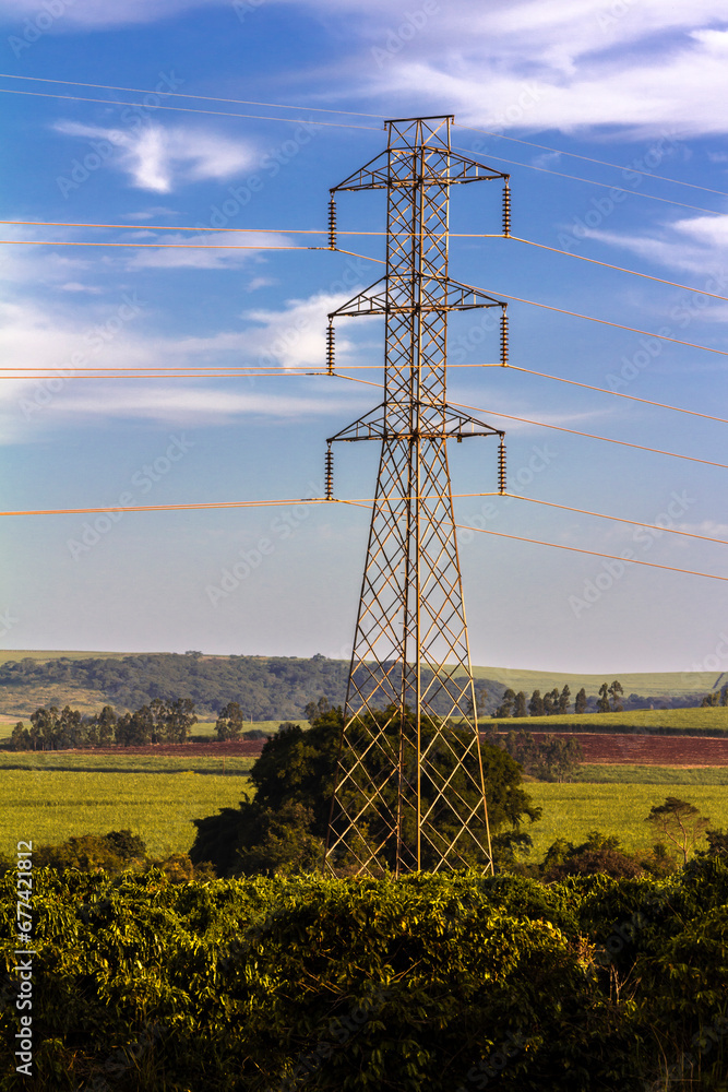 Metal poles electric supports for high-voltage wires in the fields in ...