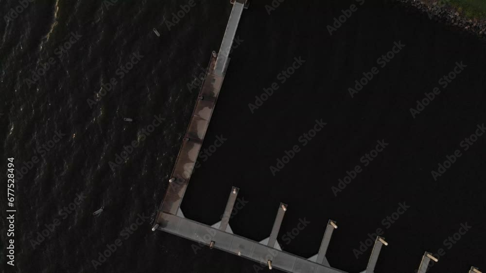 Bird's eye view of the marina and dock water Aerial drone wide shot of ...