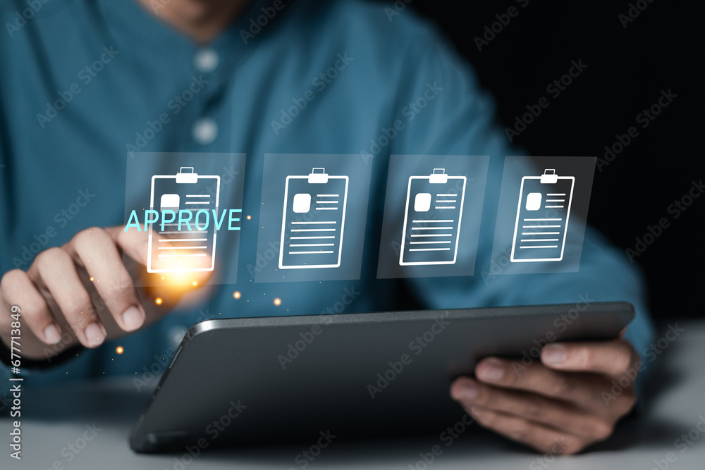 Businessman use tablet with approve document on virtual screen for ...
