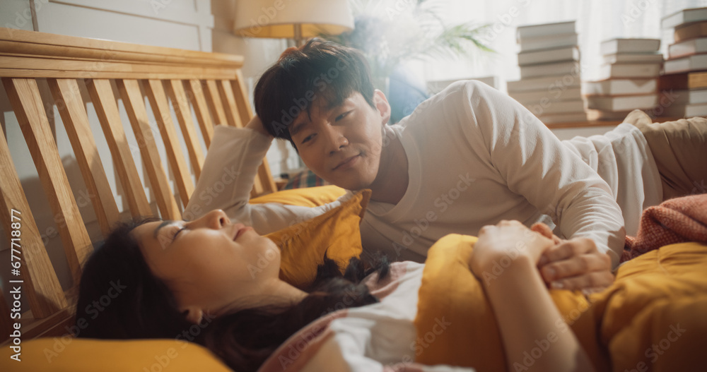 Beautiful Young Korean Couple Sleeping in Bed, Sun Shines on Them, They ...