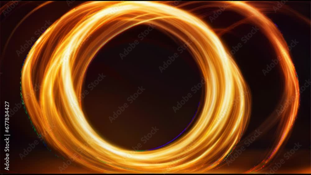 A ring of fire burns in the darkness, captured as a circular trail ...