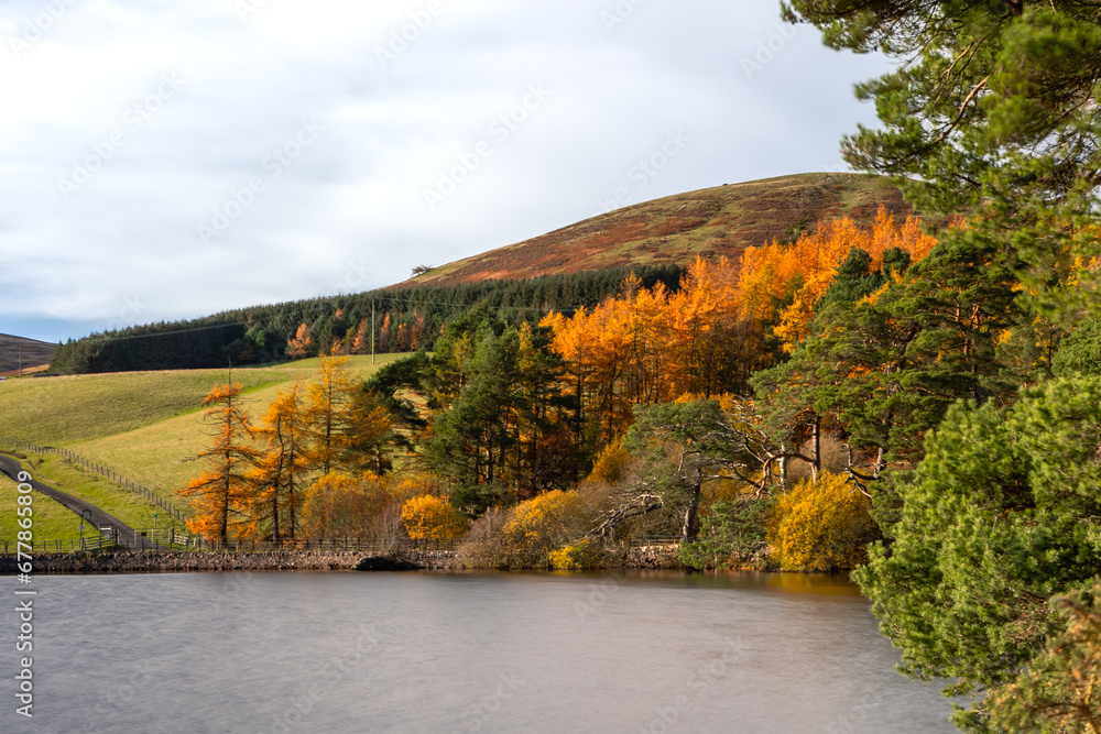 Expansive views of a valley in Scottish highlands in colourful autumn ...