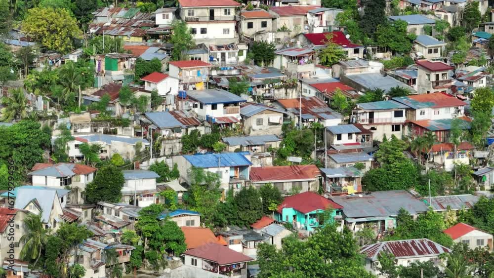 Aerial shot of the poor neighborhoods mixed in with new modern high ...
