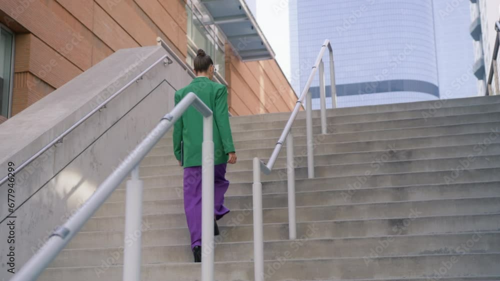 Career ladder background. Back view of successful elegant woman walking ...