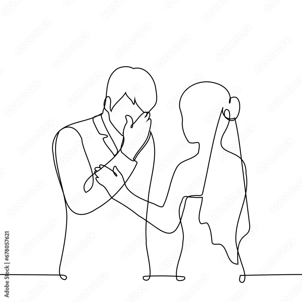 groom is crying with happiness or holding back his tears and the bride ...