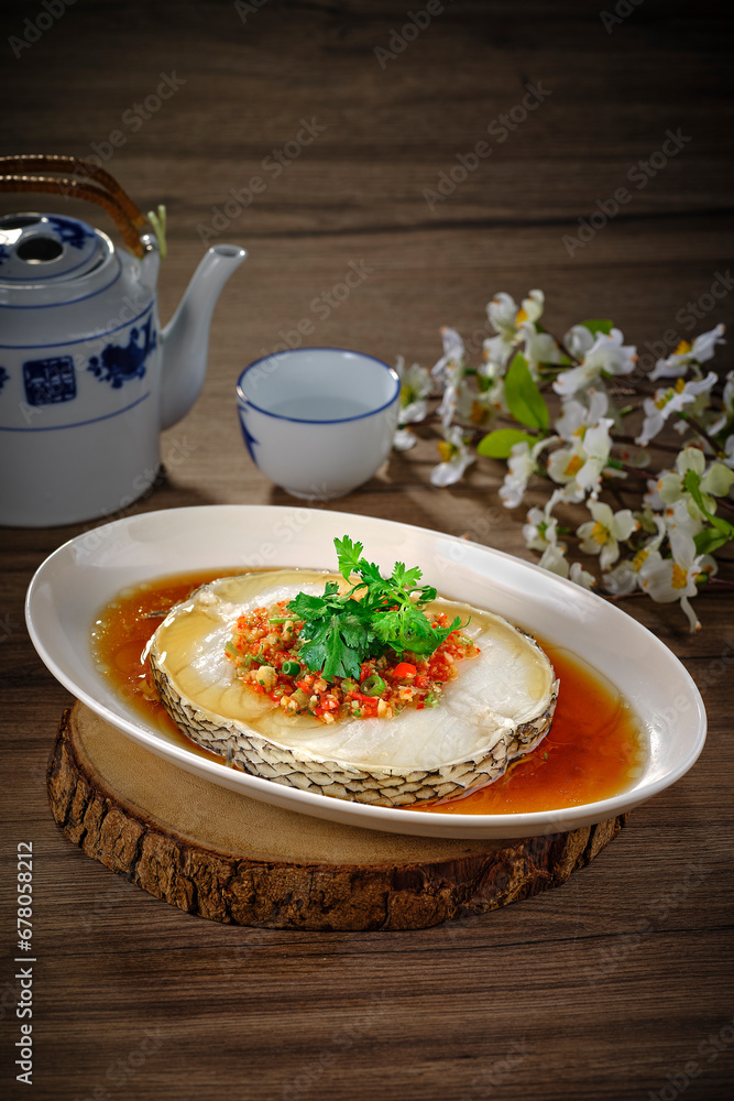 traditional chinese steamed seafood fresh cod fish with soya sauce in ...