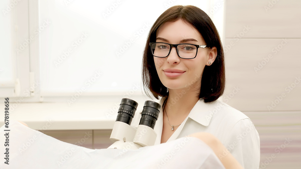 Patient and doctor in a gynecological office during a colposcopy ...