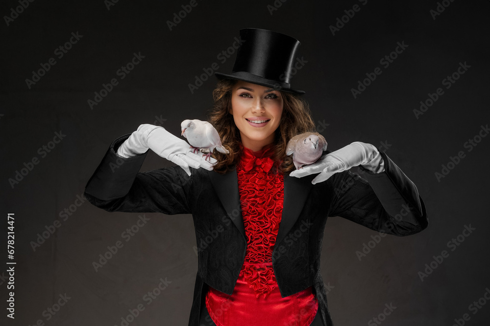 Female magician in magician attire and a black top hat, showcasing her ...