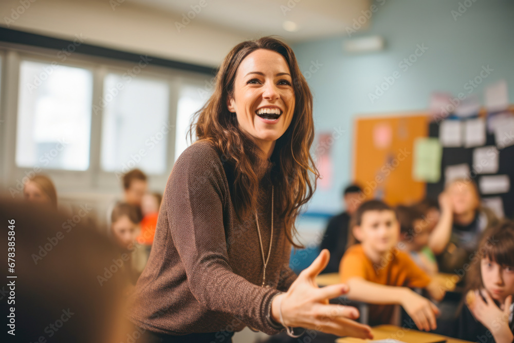 A female teacher in a classroom, passionately engaging with students ...