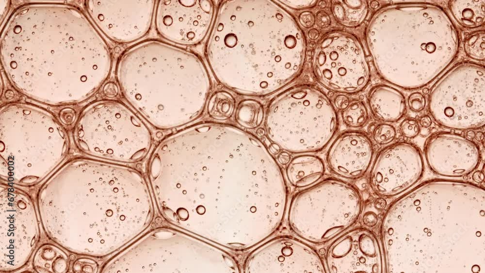 Bubble cluster, cells under a microscope. Transparent cosmetic gel ...