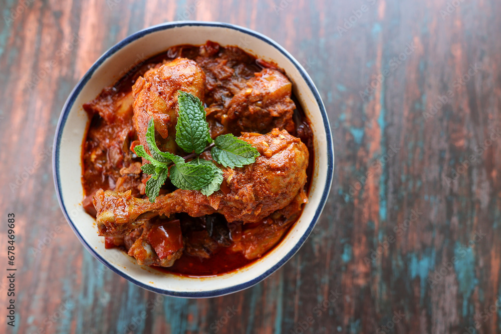 Spicy red chicken curry. Goan style chicken vindaloo. Butter chicken ...
