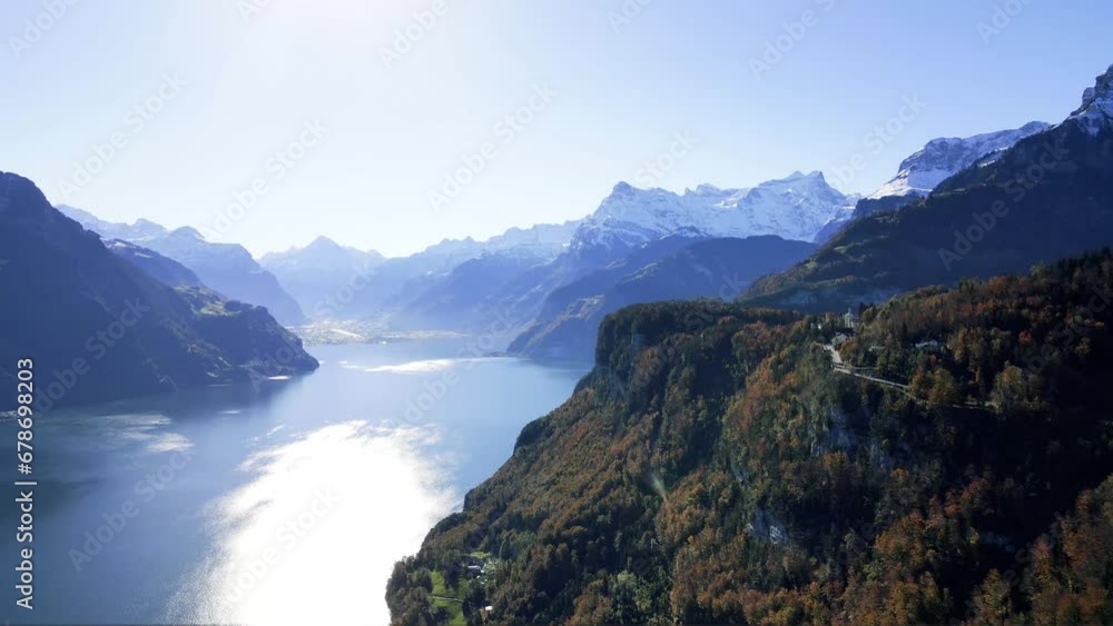panoramic aerial view of Lake Uri below the alpine village of ...