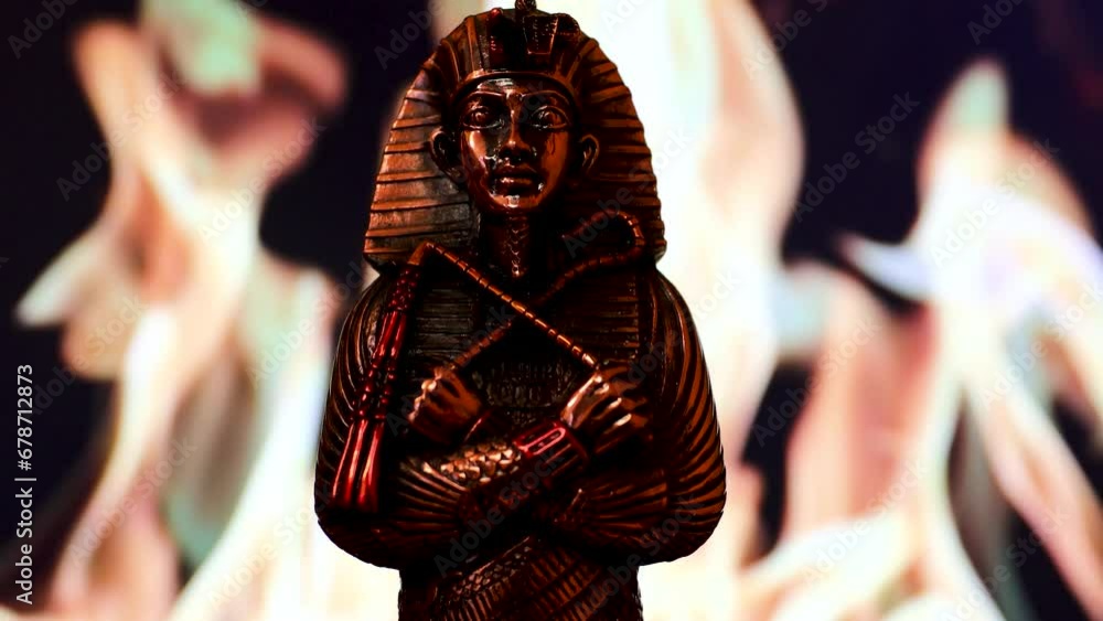 Golden statue of Pharaoh on fire background. Egyptian Culture. Stock ...