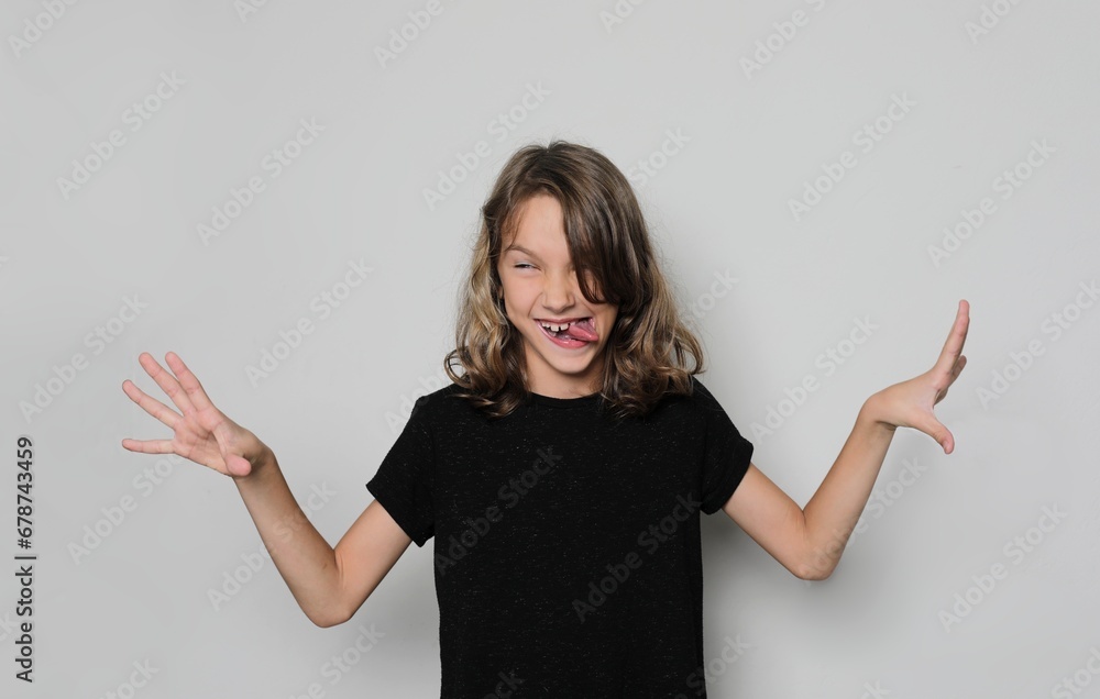 Surprise girl emotions. Surprised and happy child, arms to the sides ...