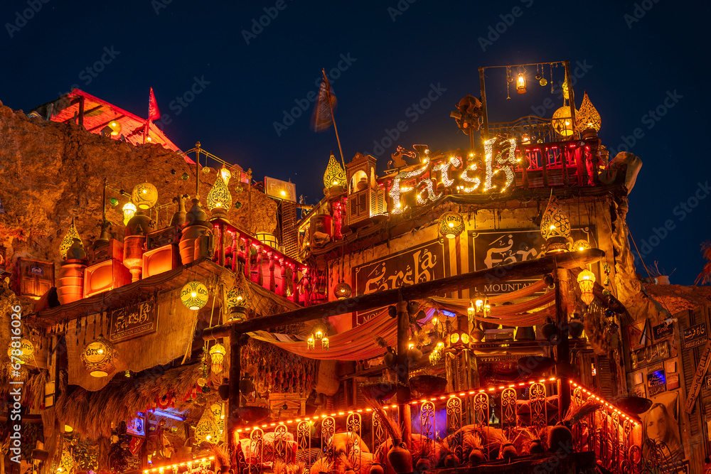 Street cafe Farsha with original design in arabic style at night, Sharm ...