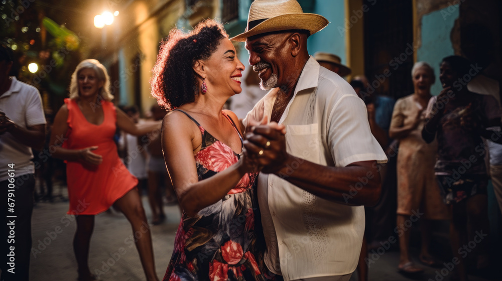 Cuban couple dance a romantic traditional salsa in a Cuban street Stock Photo | Adobe Stock
