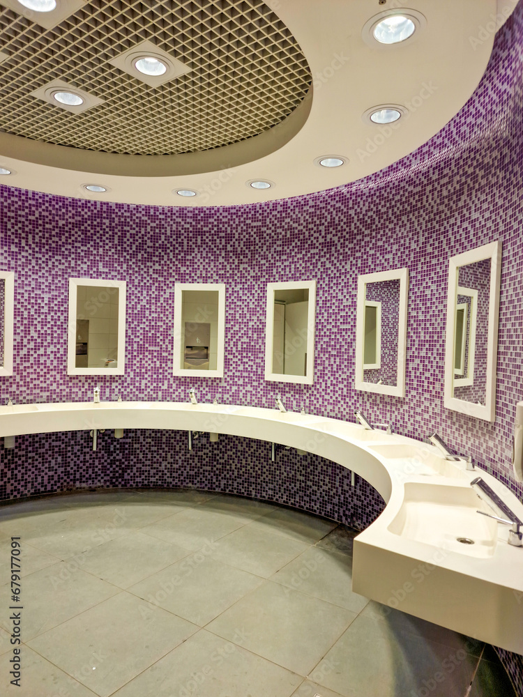 modern public toilet interior. semicircular commercial bathroom with ...