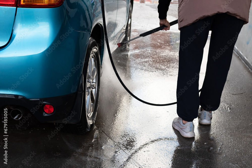 Manual car wash with pressurized water in car wash outside. Summer Car ...