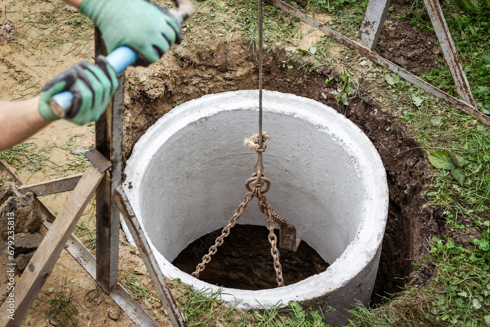 Septic Tank or Well Installing for Country House. Septic Well Concrete ...