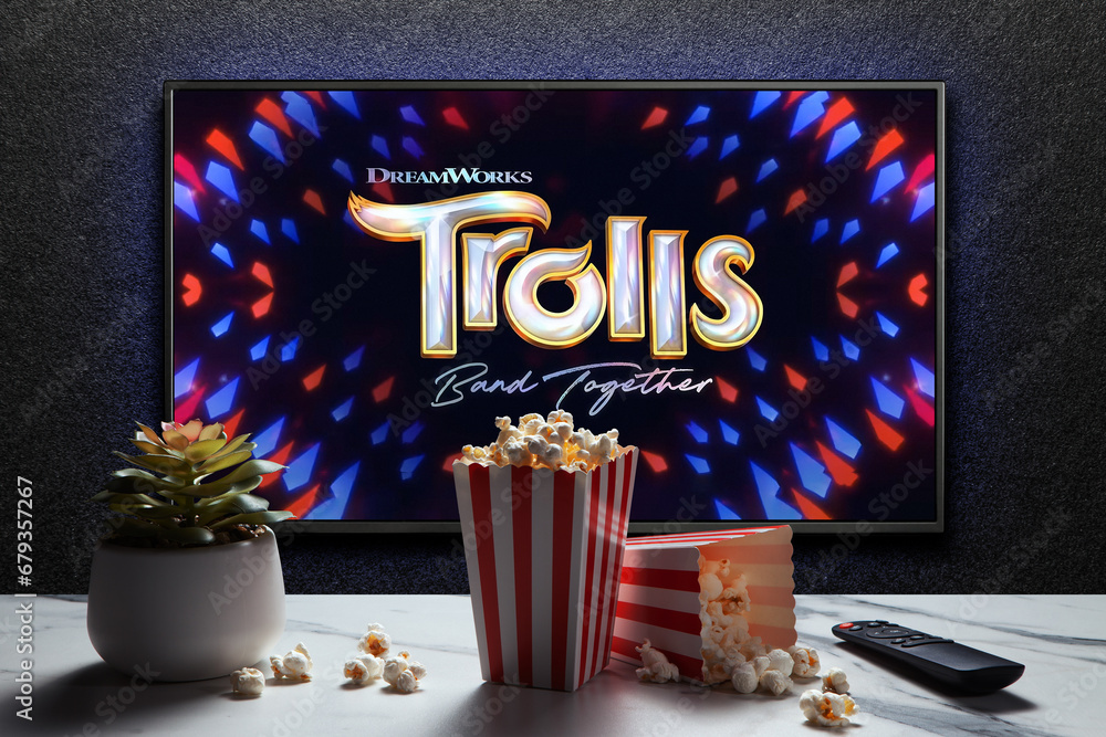 Trolls Band Together trailer or movie on TV screen. TV with remote ...