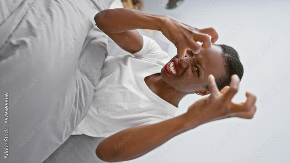 Crazy rage fills the room as an angry african american woman yells in ...