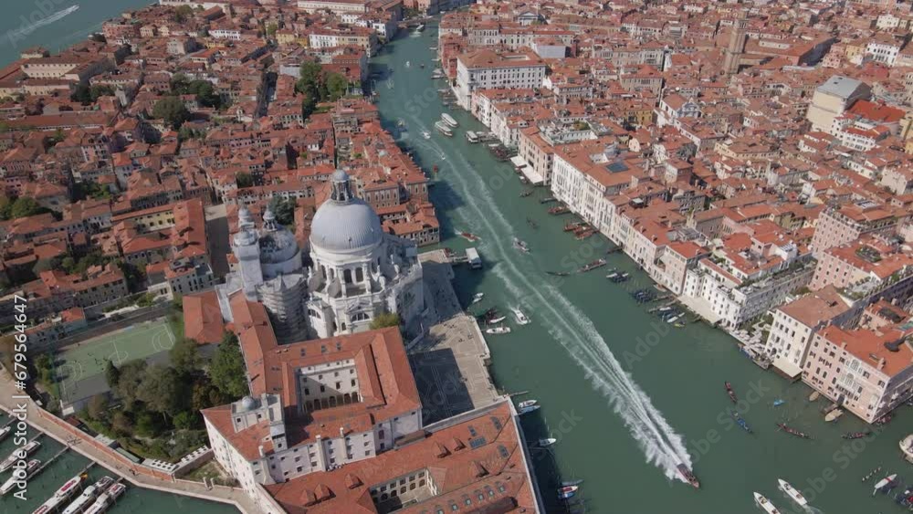 birds eye view of classic venice italy midday with boats and cathedrals ...