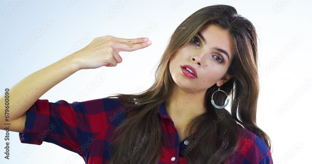 Finger gun, depression and face of woman in studio for emoji, reaction ...