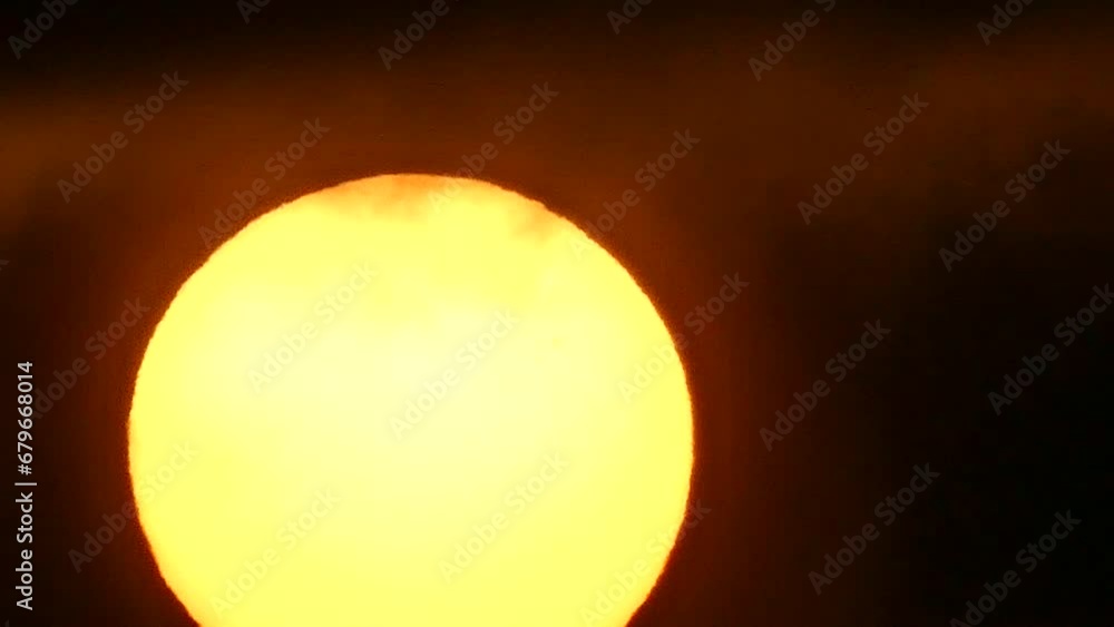 Dark sky, yellow solar disk, Atmospheric refraction, sunspots in ...