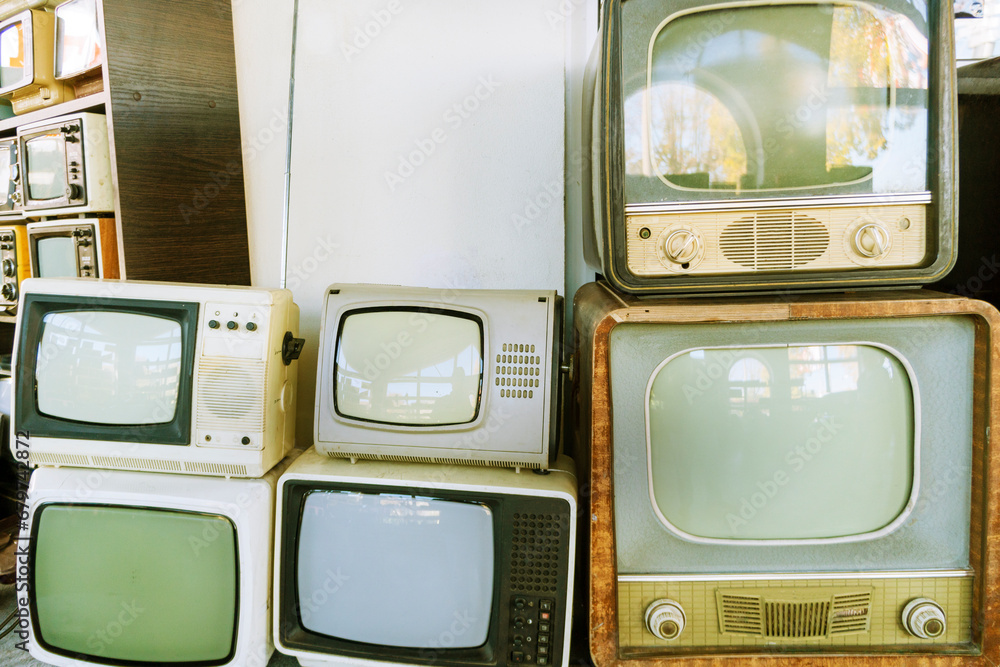 Many retro television. vintage old TV is colorful multi-row. Seeing the ...