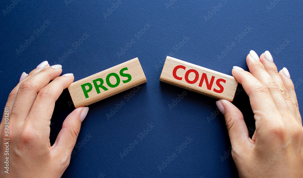 Pros vs Cons symbol. Concept word Pros vs Cons on wooden blocks ...