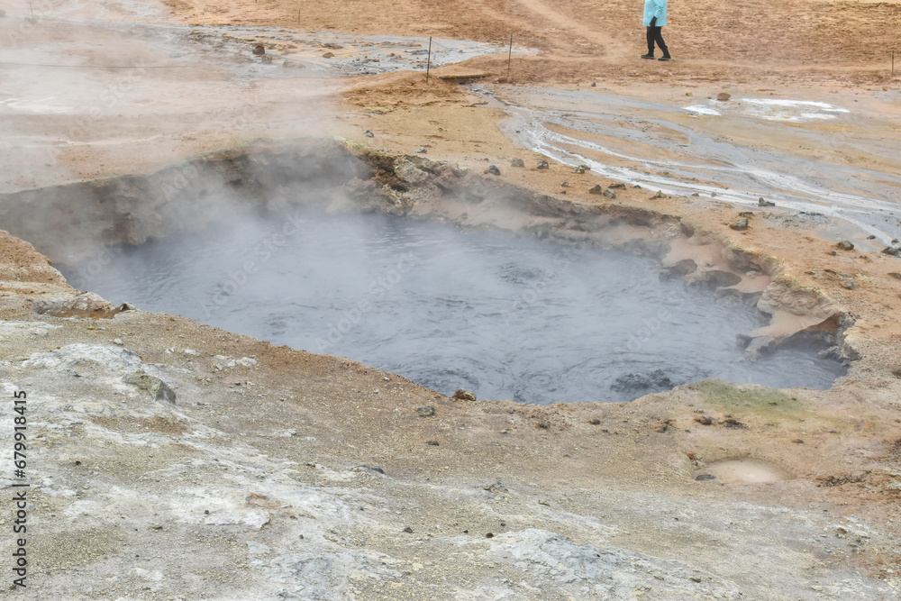 A mudpot bubbles with mud at temperatures above the boiling point in ...