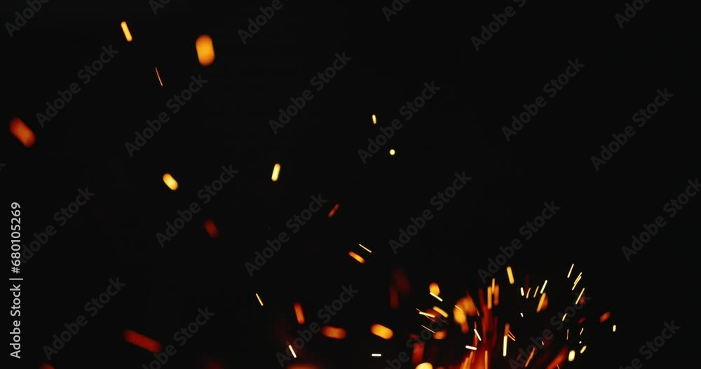 Sparks of fire on black background. Red yellow orange sparks of hot ...