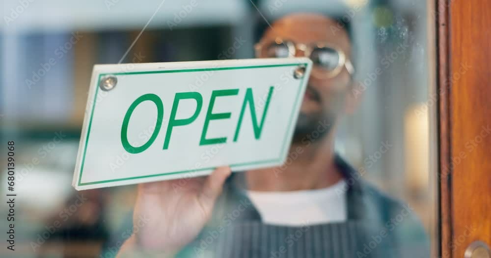 Open sign, glass door and happy restaurant man, small business owner or ...