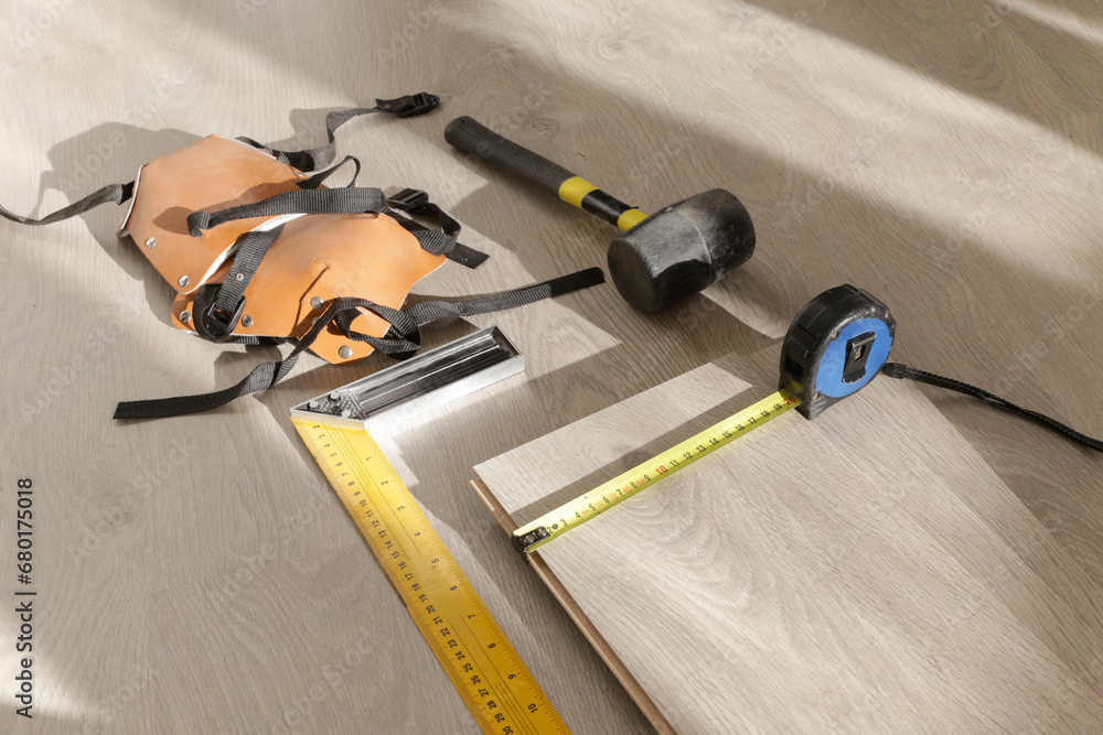 Rubber hammer, ruler with angle bar, tape meter, jig saw and other ...