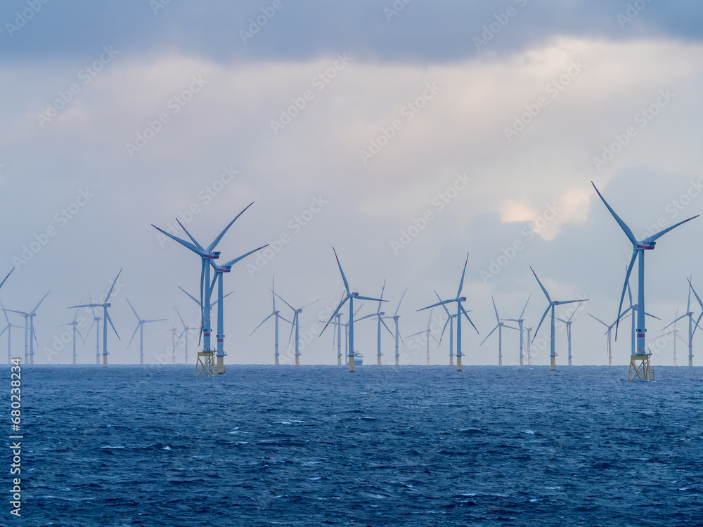 Offshore and Onshore Windmill farm Westermeerwind, Windmill park in the ...