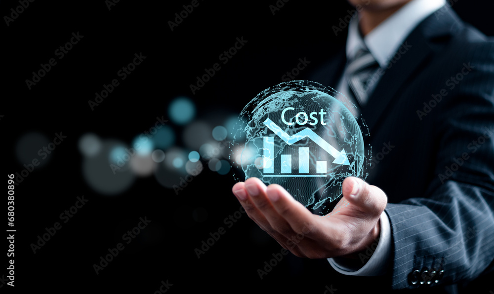 Cost reduction Concept. Businessman holding global network with graph ...