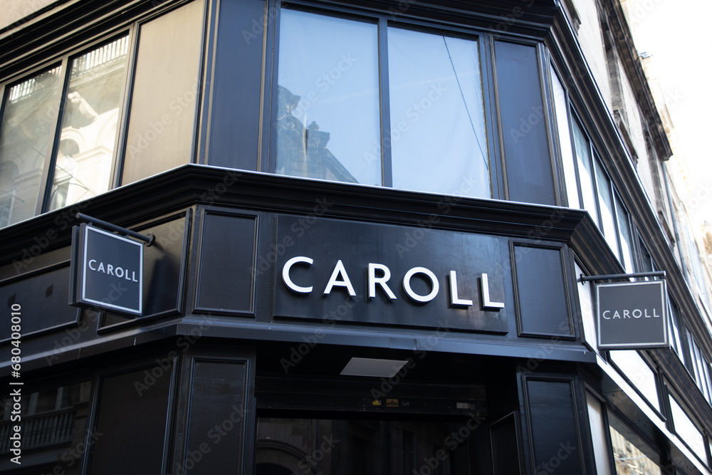 Caroll logo text and chain sign fashion brand clothes store french ...