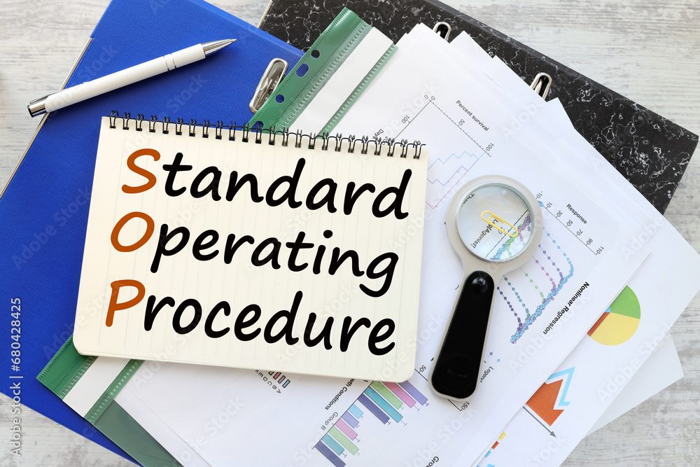 SOP - Standard Operating Procedure, work desk blue folder blue ...