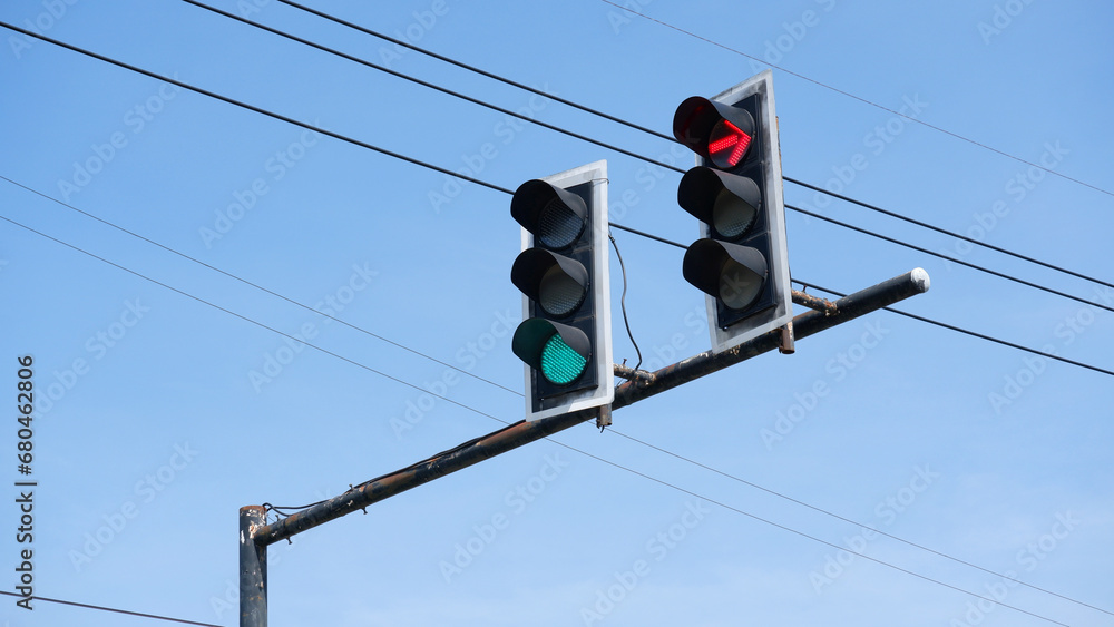 Poster A traffic signal that shows a green light for a straight line ...