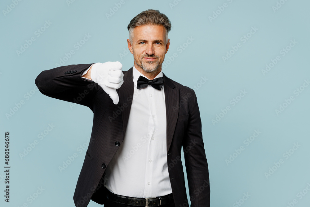 Adult sad barista male waiter butler man wear shirt black suit bow tie ...