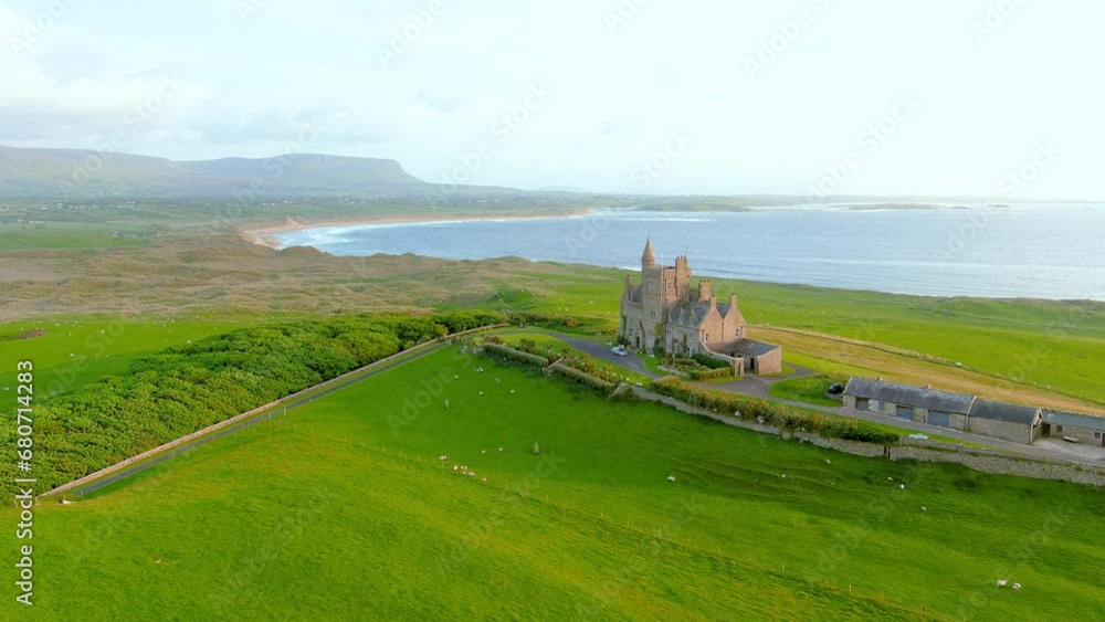 Spectacular aerial sunset view of Mullaghmore Head with huge waves ...