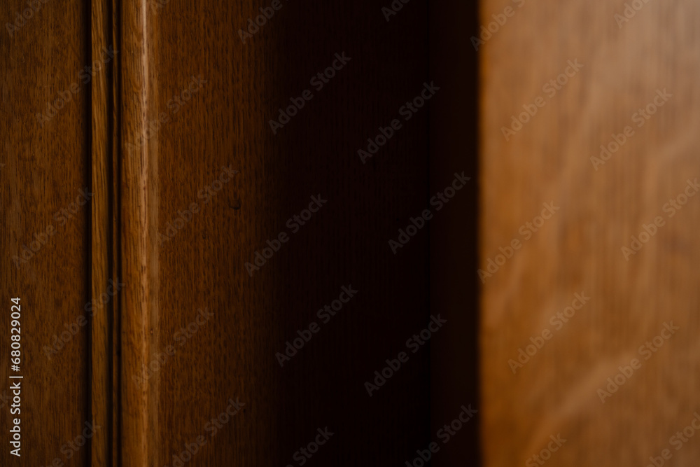 Details of the texture on historic wood paneling, with dramatic shadows ...