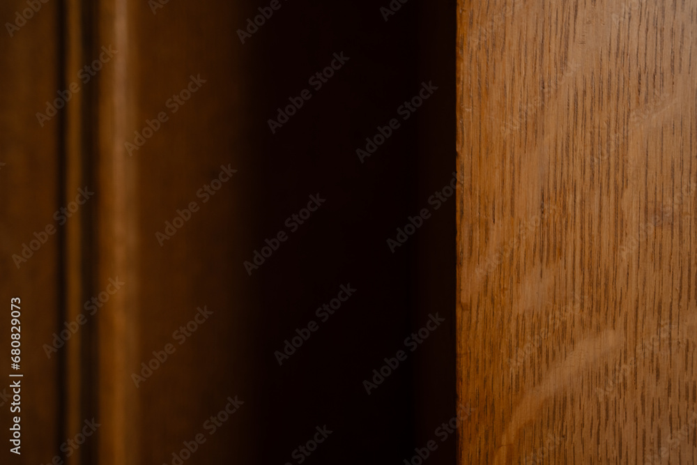 Details of the texture on historic wood paneling, with dramatic shadows ...