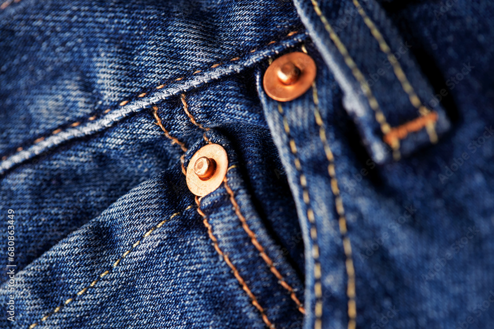 Close up of details of new Jeans. Buttons and seams and pockets close ...