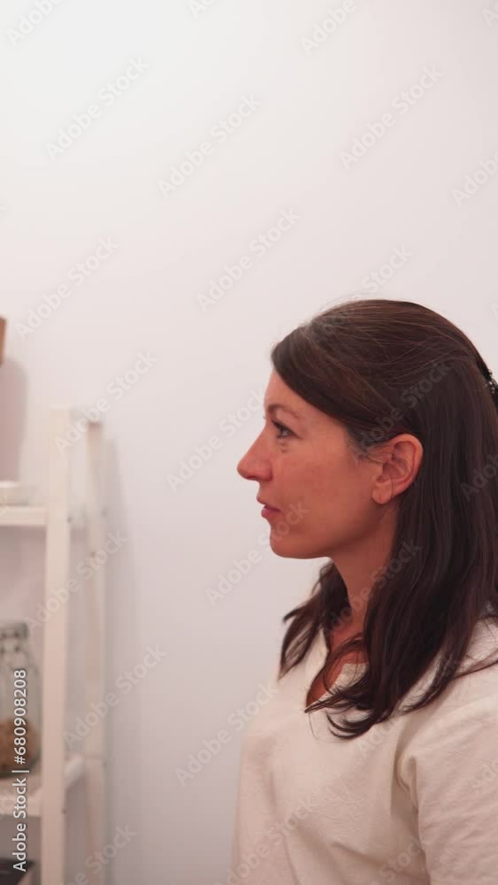 Therapist talking with patient on a small business healthcare clinic ...