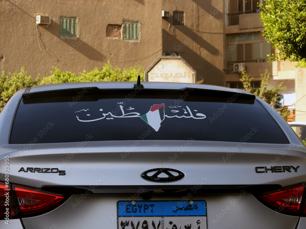Cairo, Egypt, November 14 2023: Arabic word of Palestine on the back ...