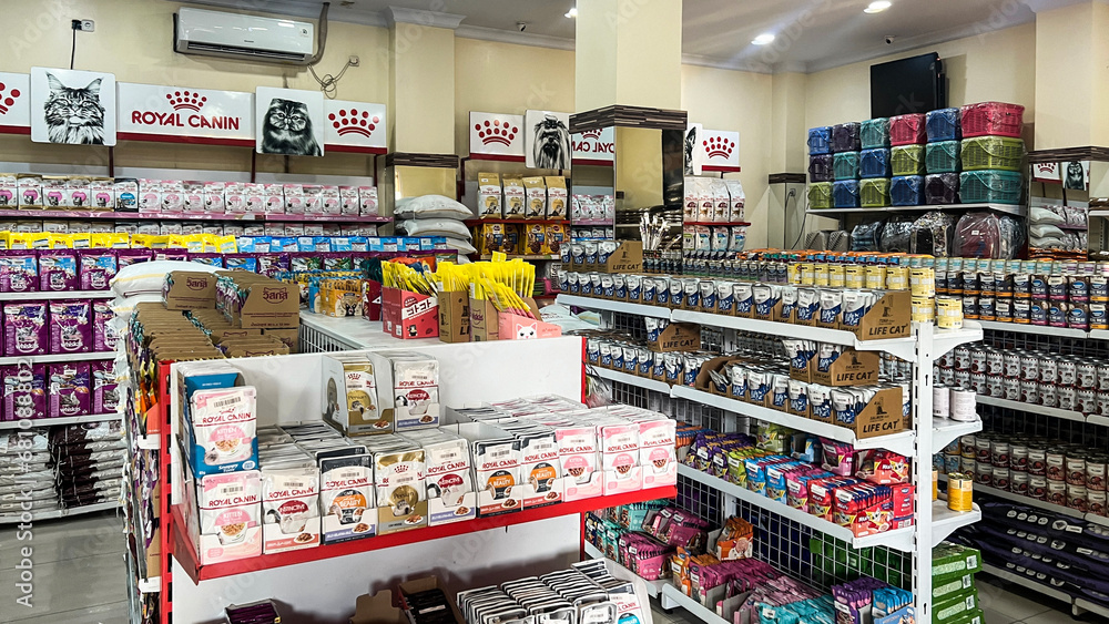 Food department for dogs and cats. Shelving with various types of food ...