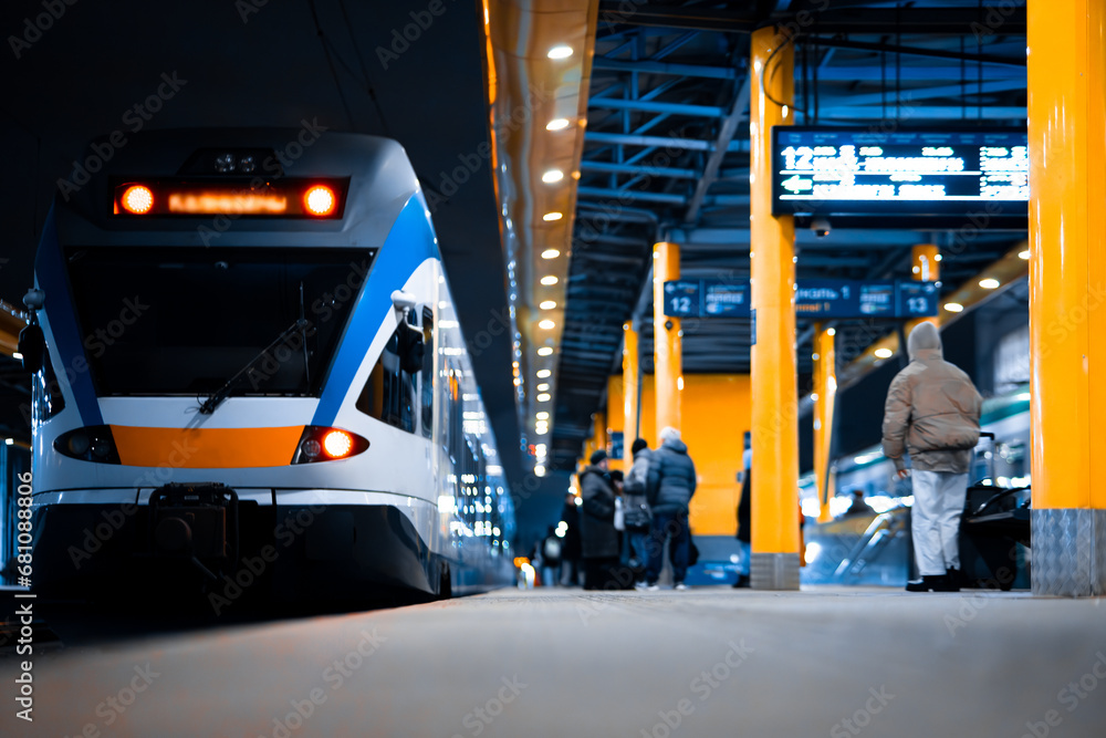 Passenger railway transport, a modern train at the station standing on ...